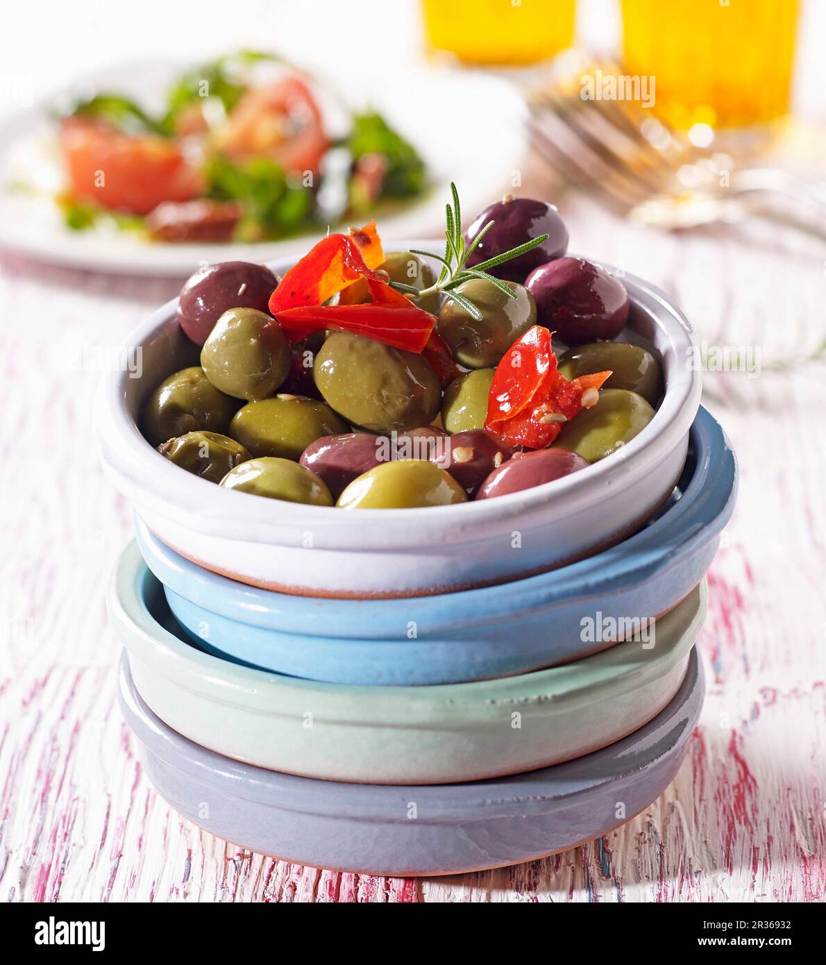 Spicy olives with peppers Stock Photo - Alamy