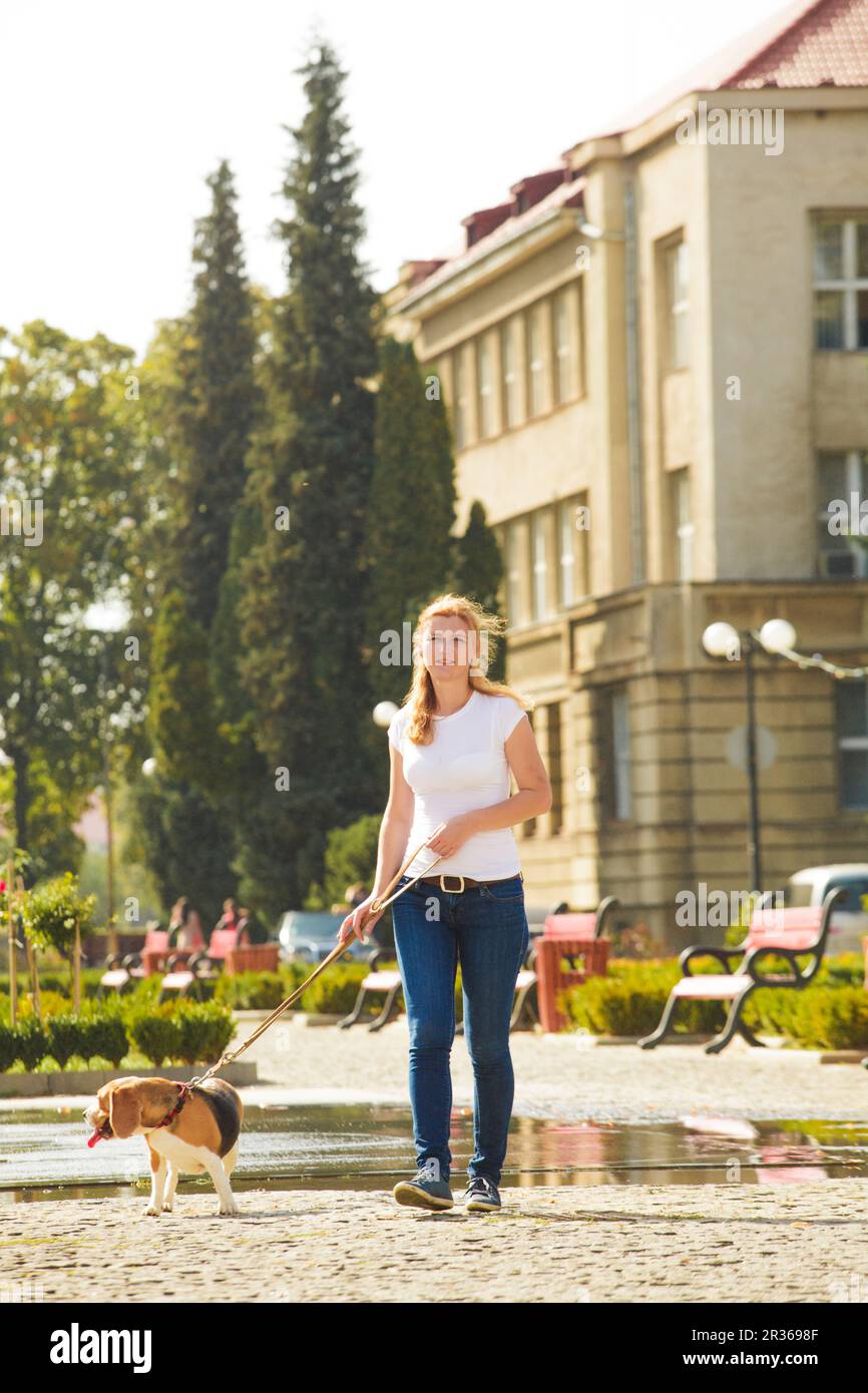 Woman dog walking hi-res stock photography and images - Alamy