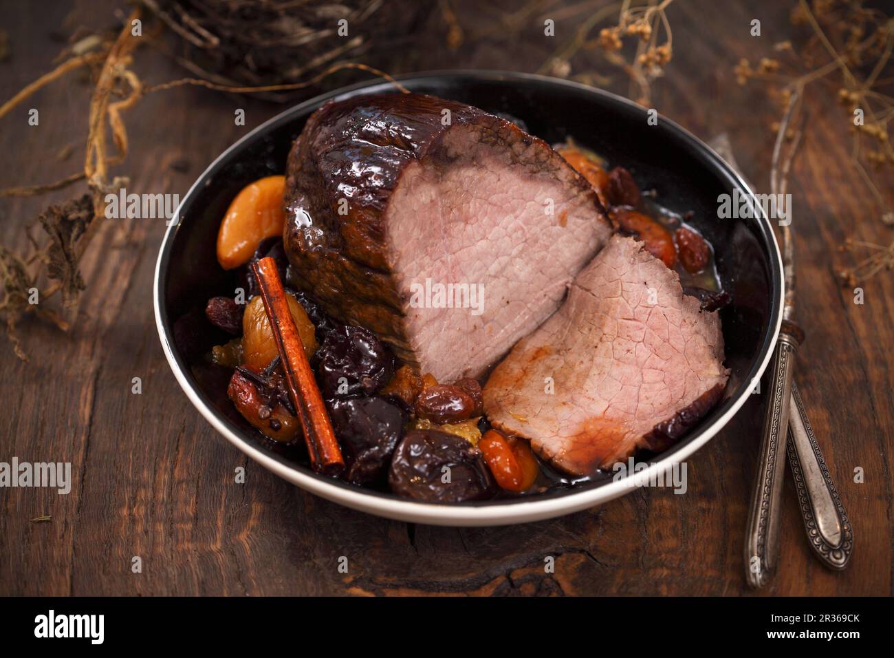 Roast beef with dried fruit Stock Photo - Alamy