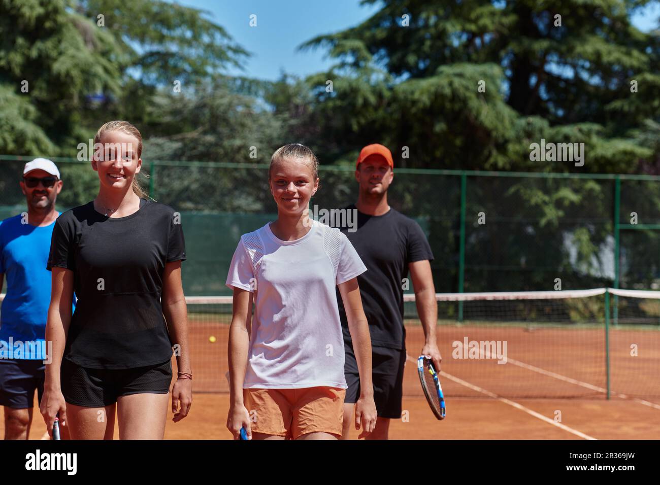 Tennis club together after hard training, showing their dedication ...