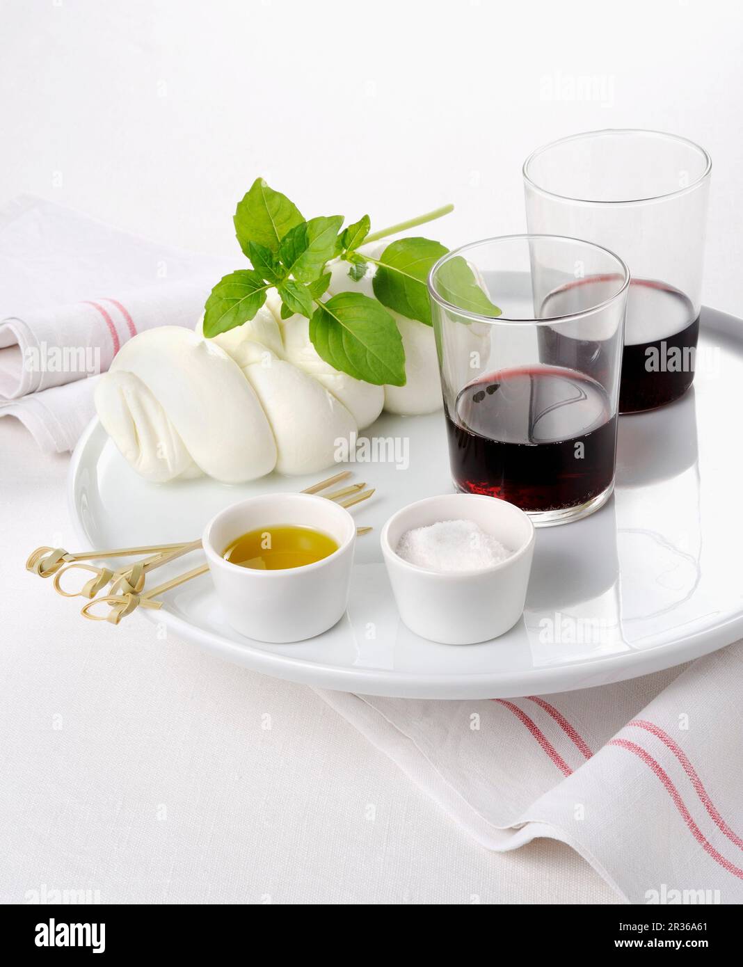 Mozzarella braid on a serving platter Stock Photo - Alamy