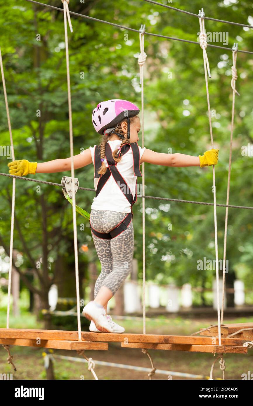 The obstacle course in adventure park Stock Photo - Alamy