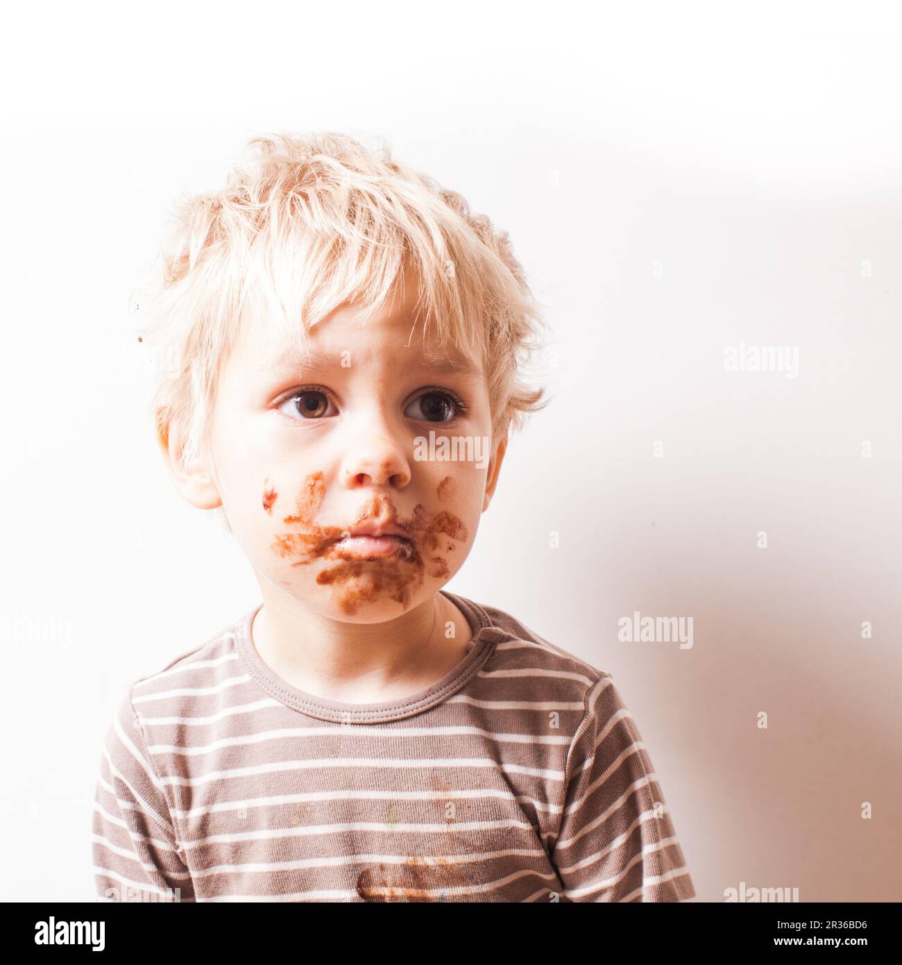 Boy eating chocolate messy hi-res stock photography and images - Alamy
