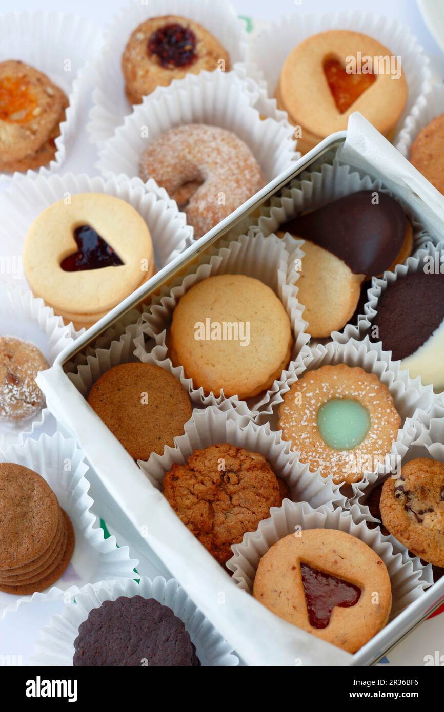 A white gift box with various cookies and Linz sandwich biscuits Stock ...