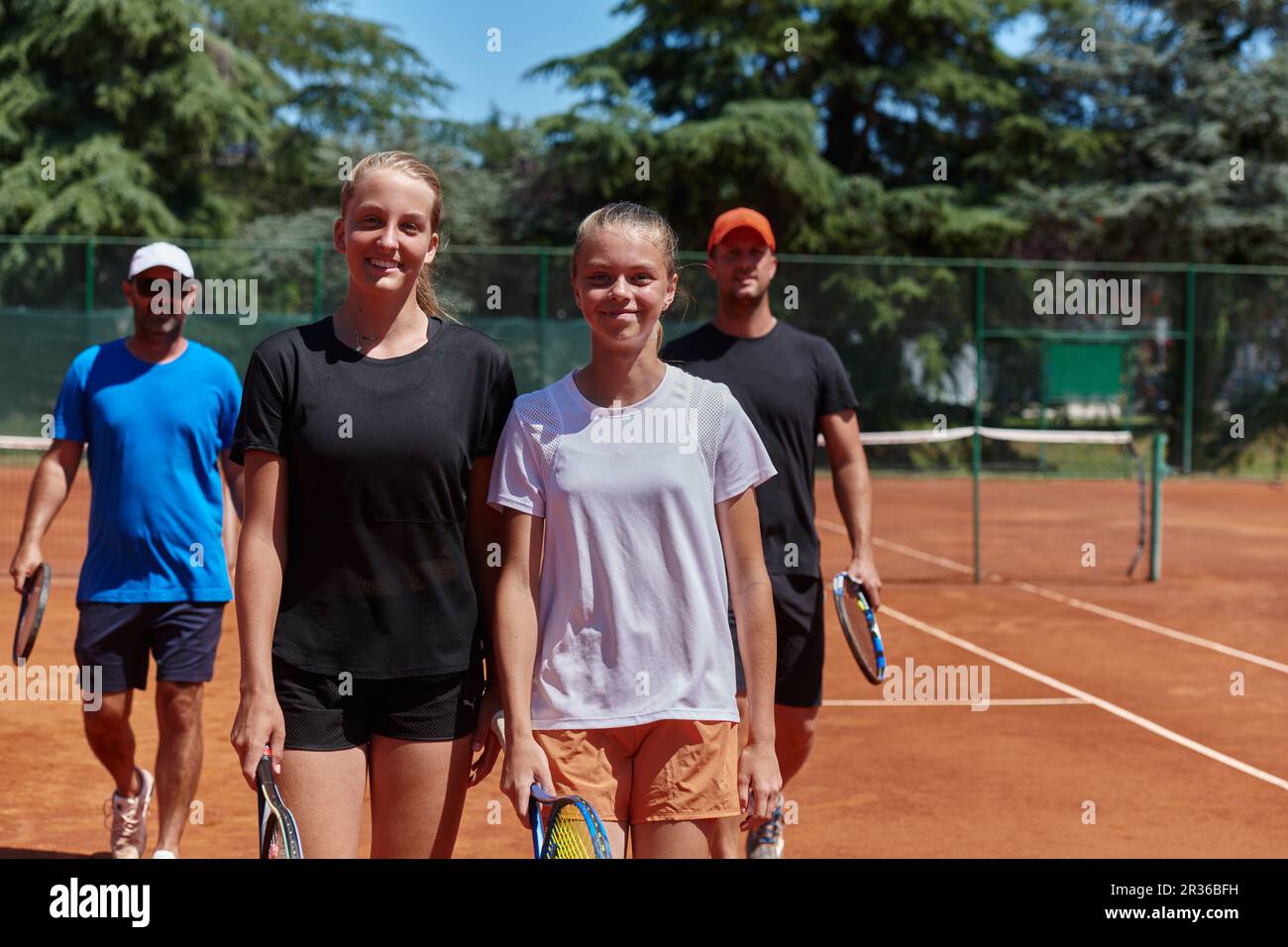 Tennis club together after hard training, showing their dedication ...