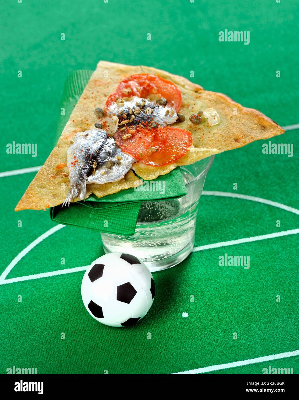 Pane carasau (unleavened bread) with sardines and football decoration ...