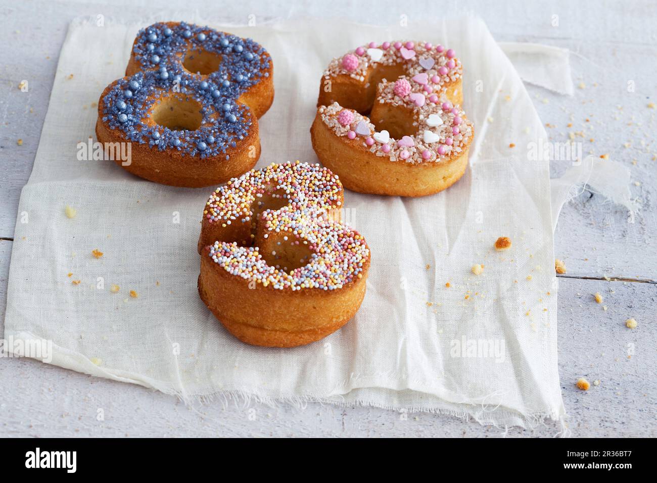 Number-shaped muffins decorated with sugar sprinkles Stock Photo - Alamy