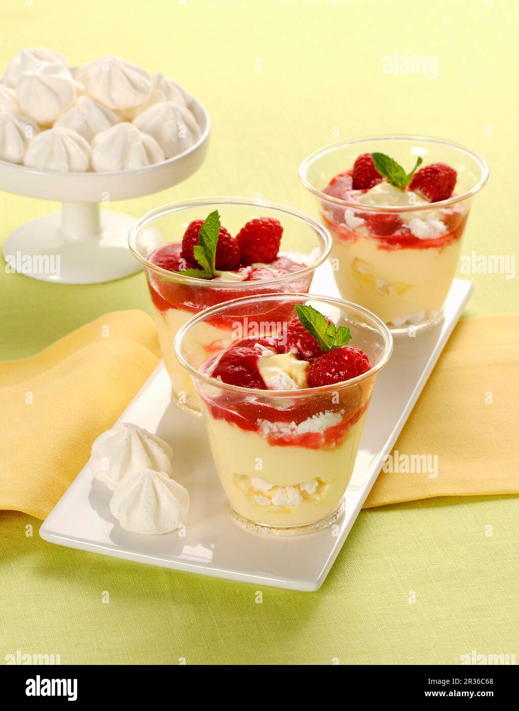 Raspberry desserts with cream and meringue Stock Photo - Alamy