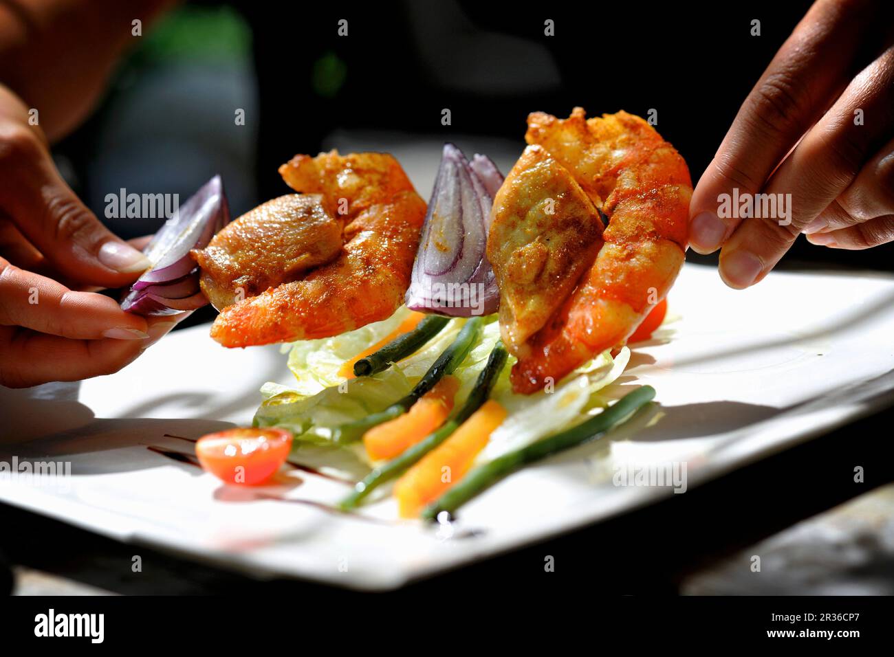Prawn kebabs with onions Stock Photo - Alamy