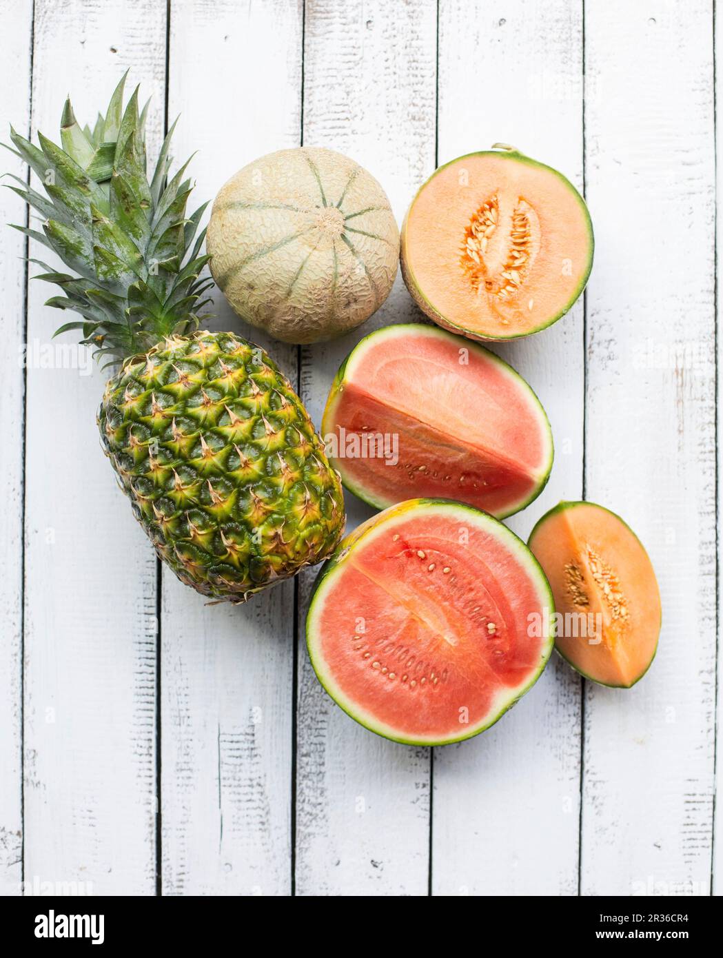 Pineapple and various melons Stock Photo - Alamy