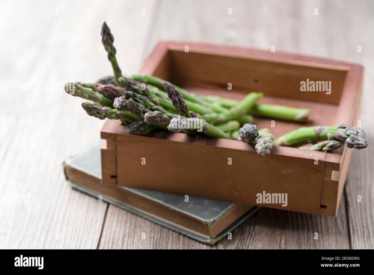 Green asparagus spears in a wooden box Stock Photo - Alamy