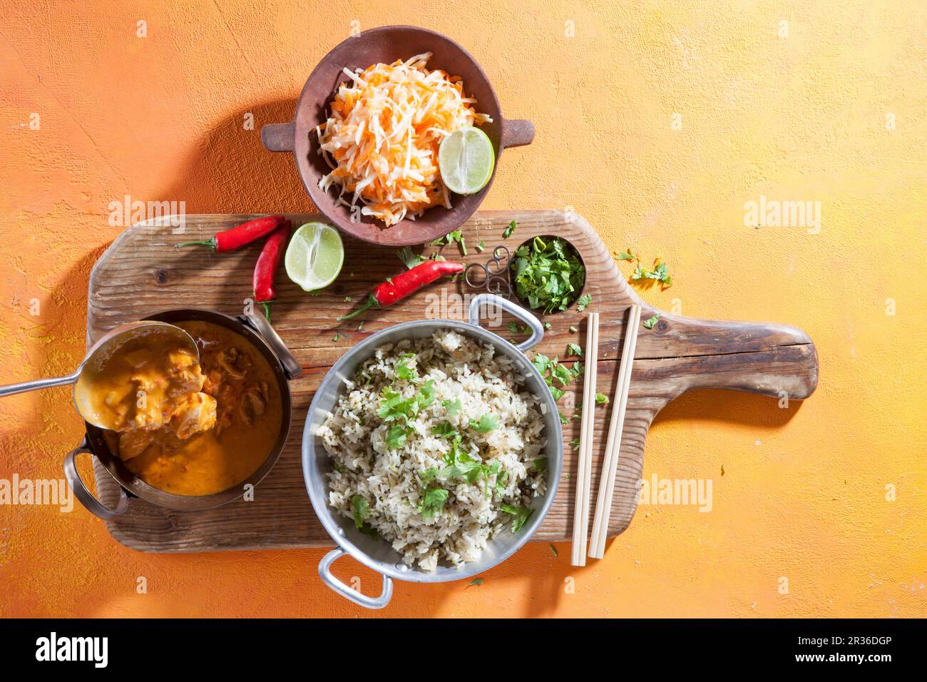 Red chicken curry with rice and salad (Asia Stock Photo - Alamy