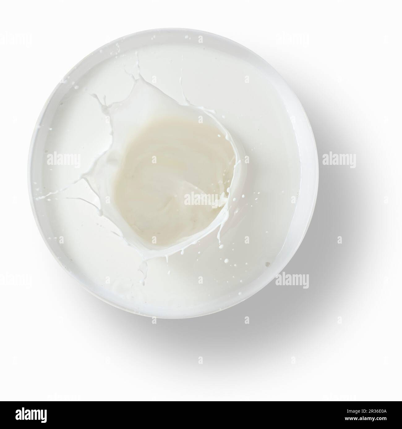 Dripping milk Cut Out Stock Images & Pictures - Alamy