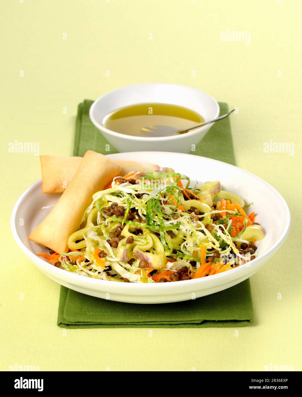 Mixed vegetable salad with lentils and spring rolls Stock Photo - Alamy