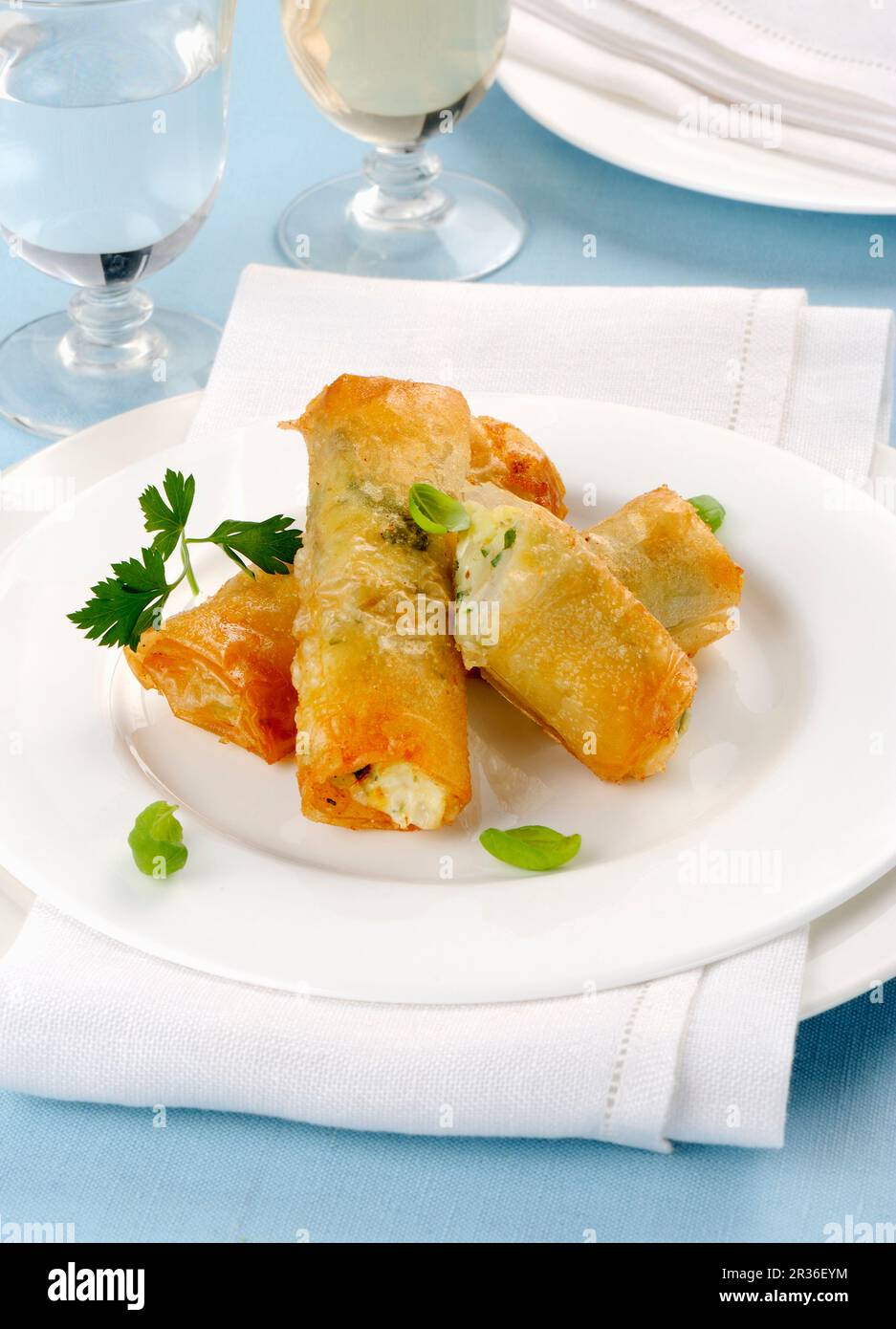 Filo pastry rolls filled with fish Stock Photo - Alamy