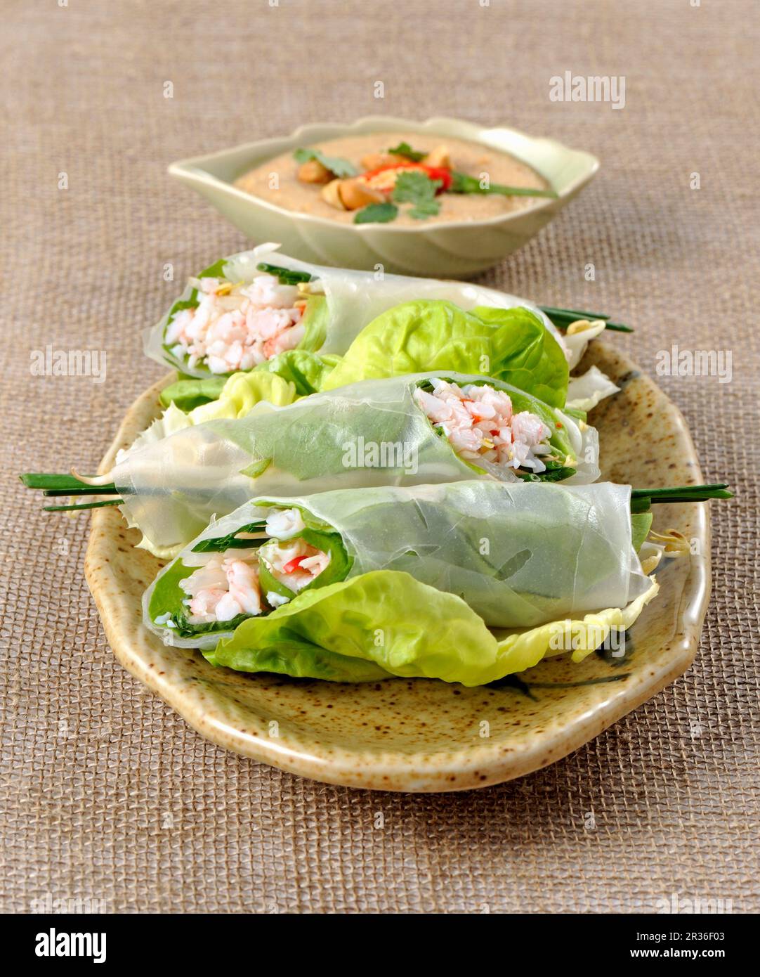 Rice paper rolls filled with prawns on lettuce leaves Stock Photo - Alamy