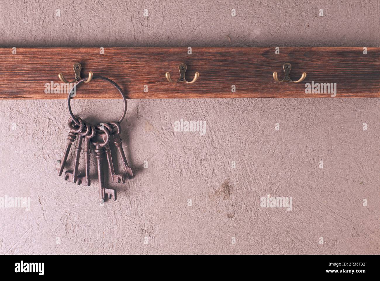 Old keys on key rack hi-res stock photography and images - Alamy