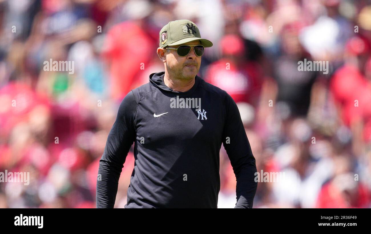 New York Yankees' manager Aaron Boone walks to the dugout in a baseball ...