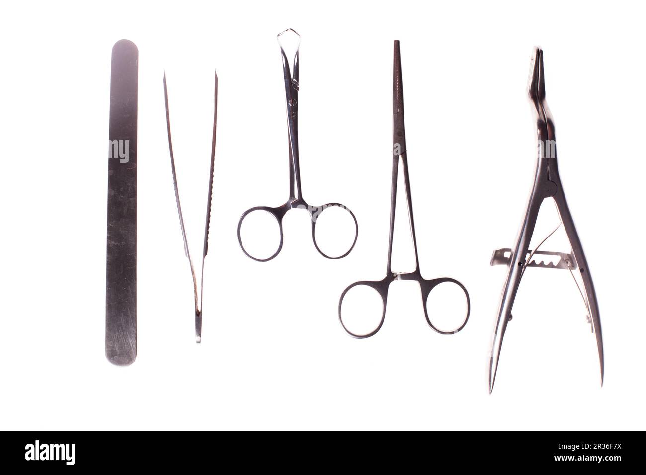 Surgery instruments isolated on white Stock Photo - Alamy
