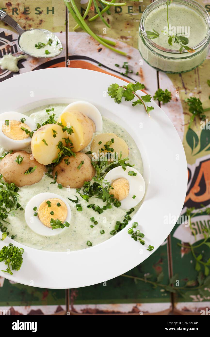 New potatoes with green sauce and hard-boiled eggs Stock Photo - Alamy