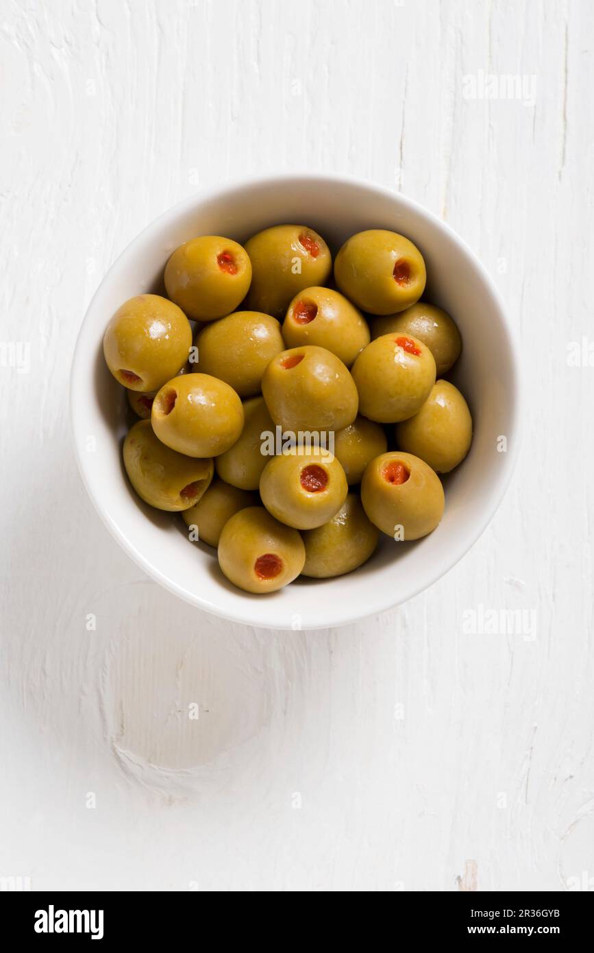 Spanish olives filled with peppers Stock Photo - Alamy