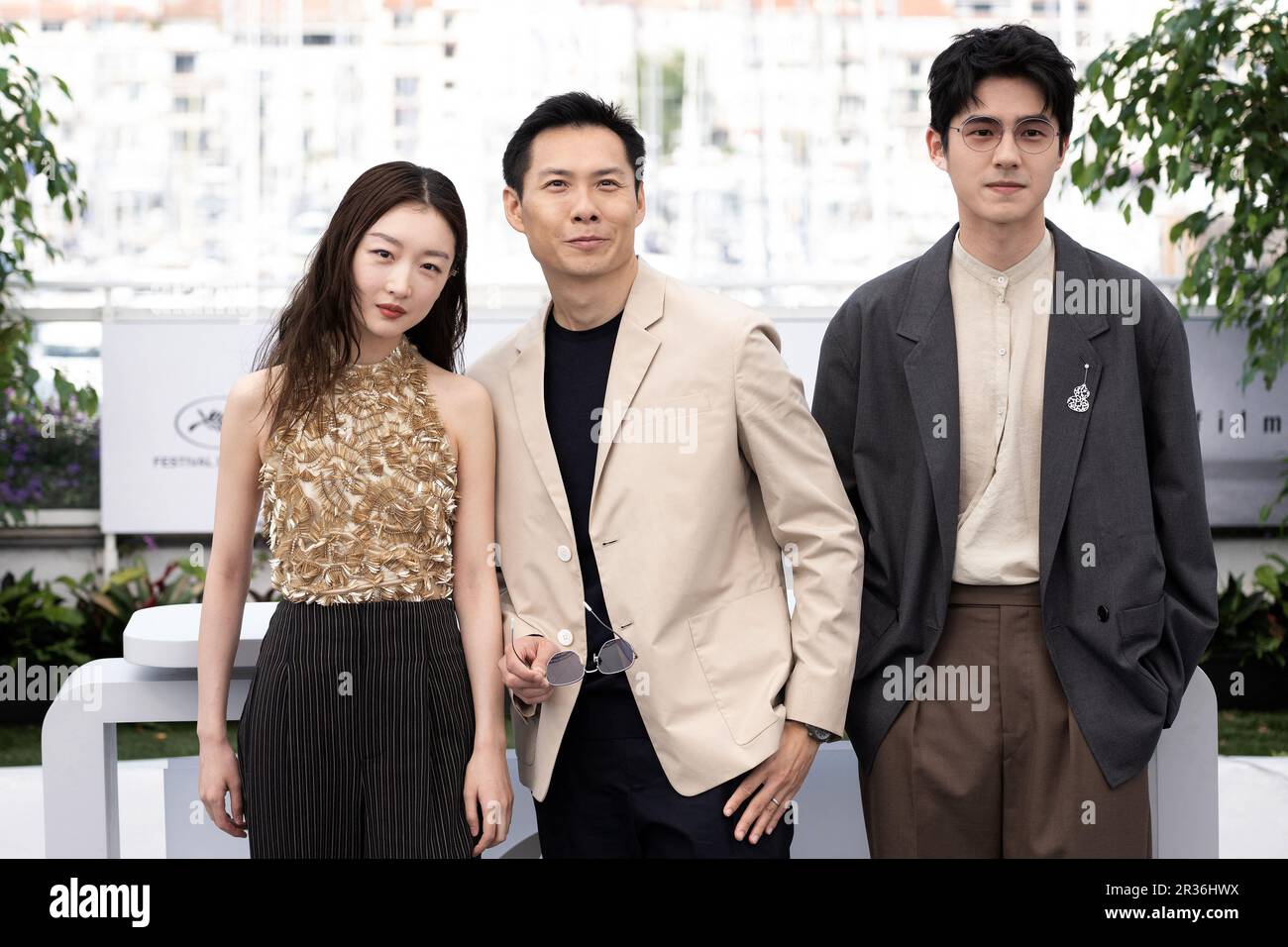 Cannes, France. 23rd May, 2023. Dongyu Zhou, Director Anthony Chen and Haoran Liu attend the Ran ...