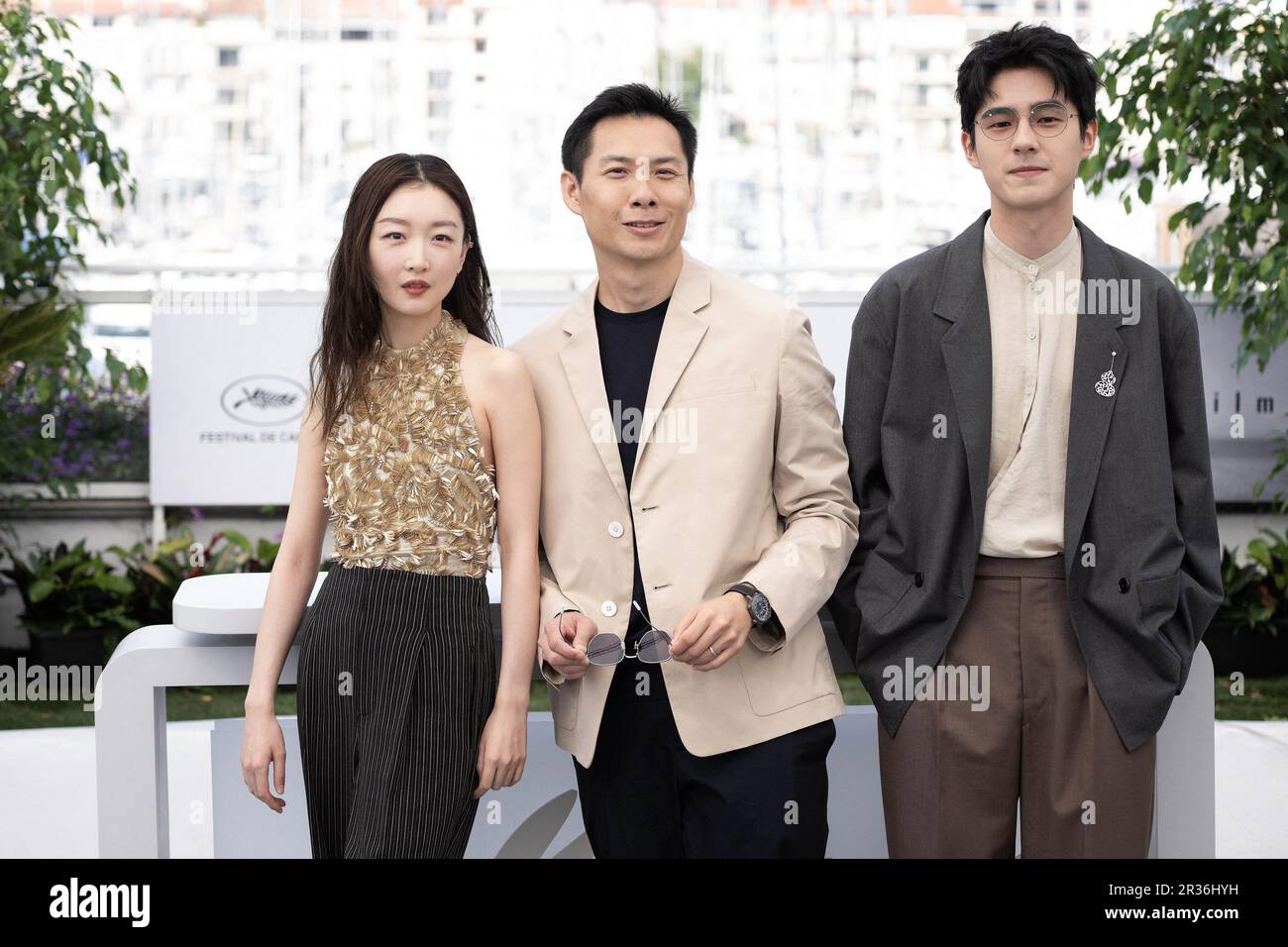 Cannes, France. 23rd May, 2023. Dongyu Zhou, Director Anthony Chen and Haoran Liu attend the Ran ...