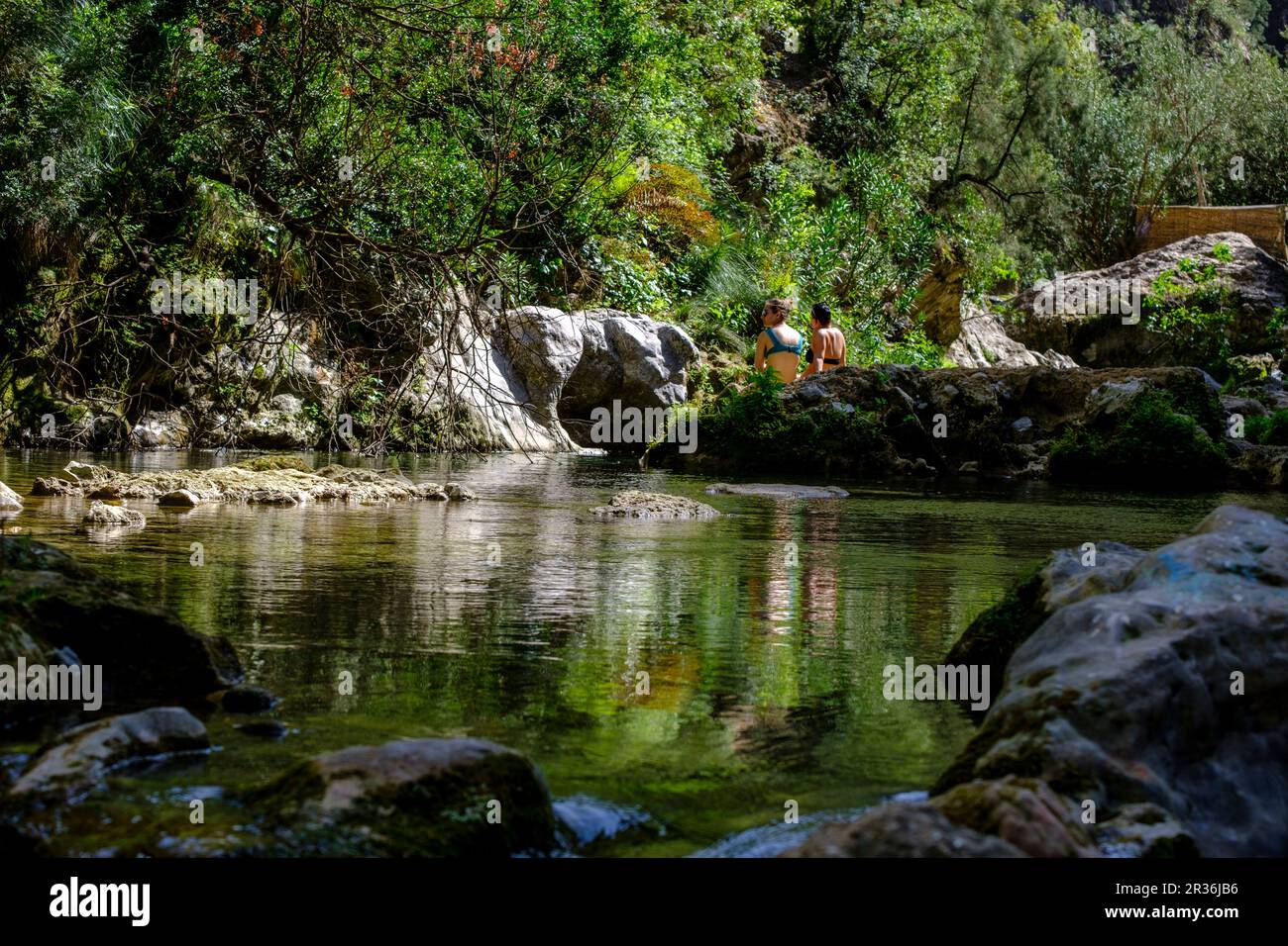 hikers bathing in the river, God's Bridge, Akchour, Talassemtane Nature ...