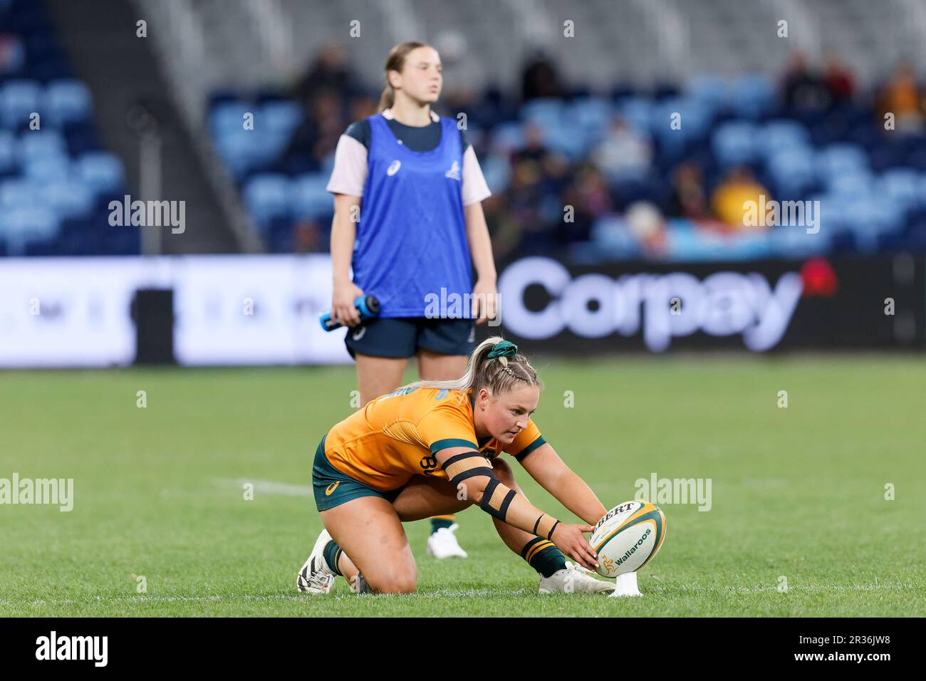 Carys Dallinger of the Australian Wallaroos prepares to kick a ...