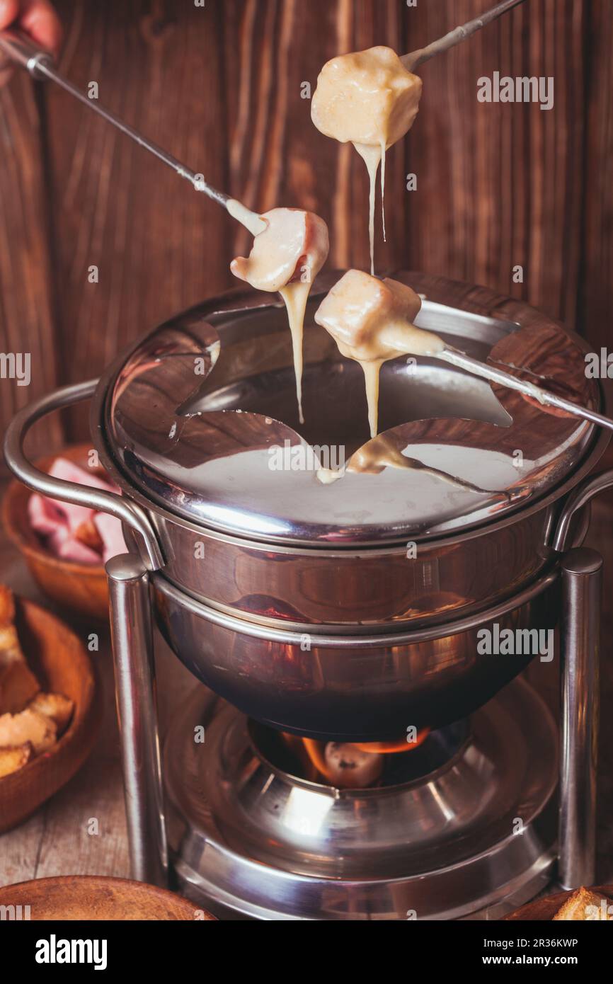 Cheese fondue hi-res stock photography and images - Alamy