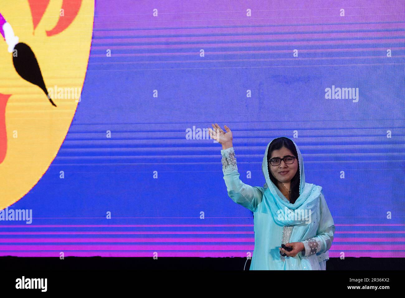 Pakistani activist Malala Yousafzai waves at a meeting with educators ...