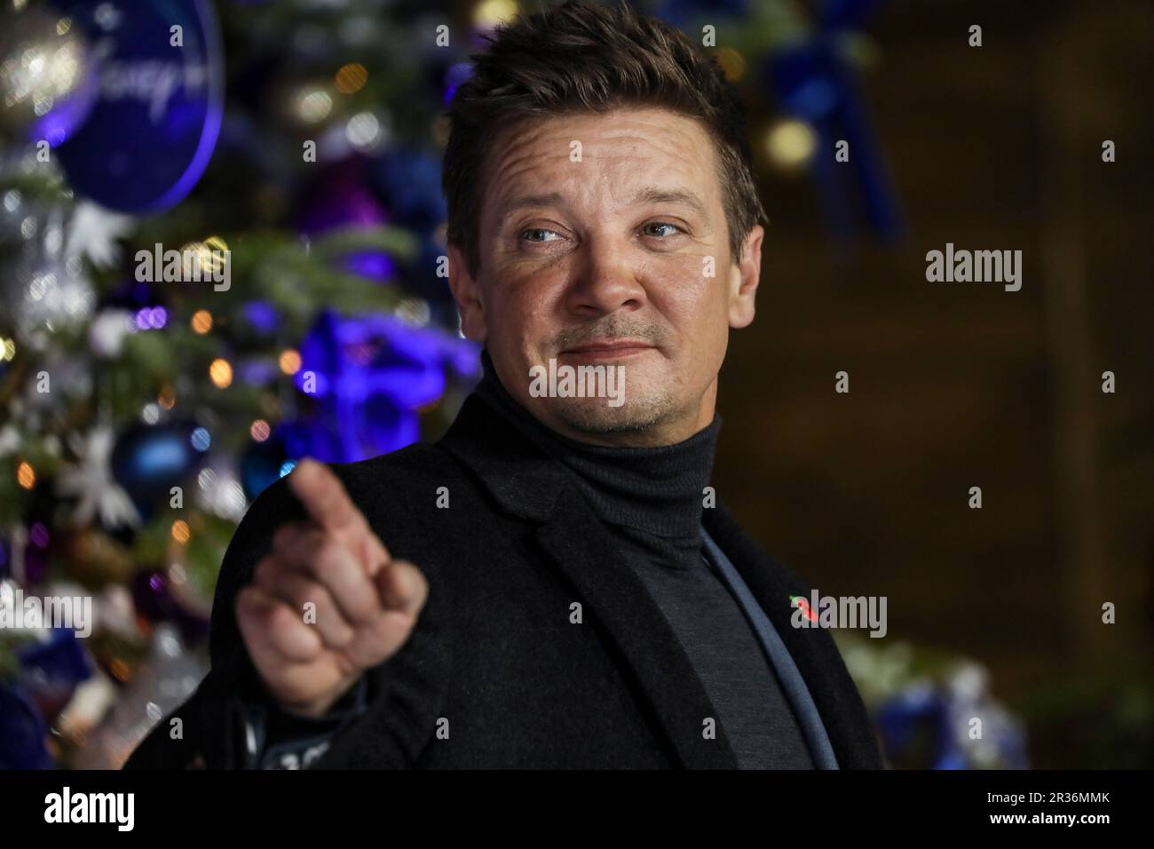 FILE - Jeremy Renner poses for photographers upon arrival at the UK Fan ...