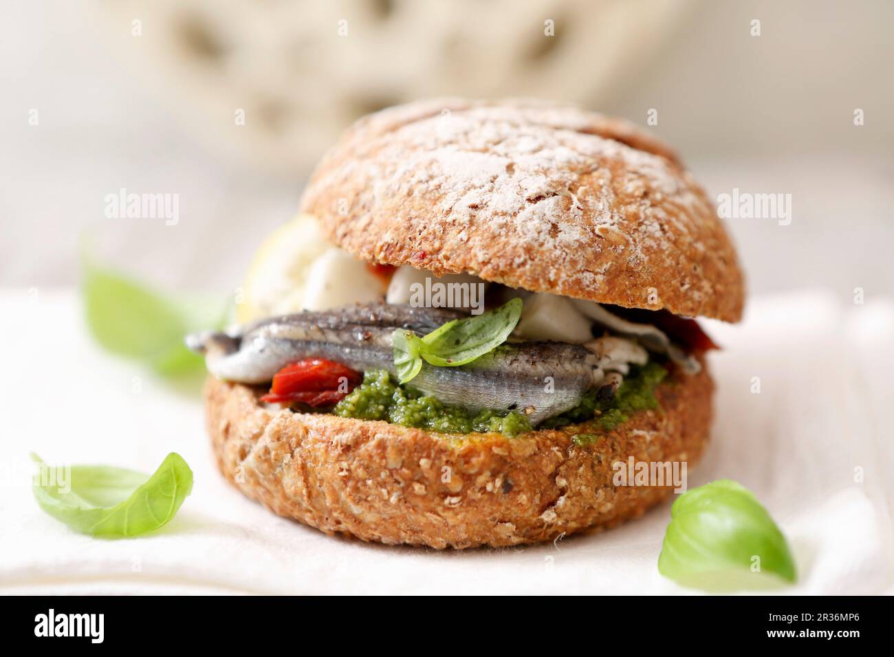 A fish roll with basil pesto Stock Photo - Alamy