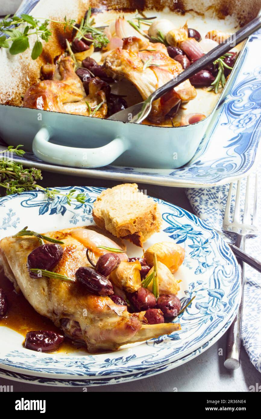 Maltese rabbit roasted with olives, rosemary and garlic Stock Photo - Alamy
