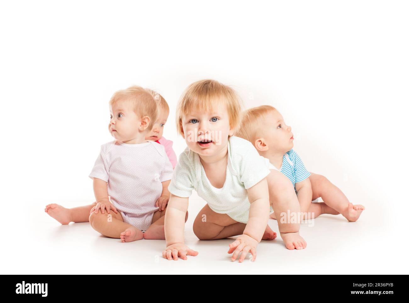 Four babies isolated Stock Photo - Alamy