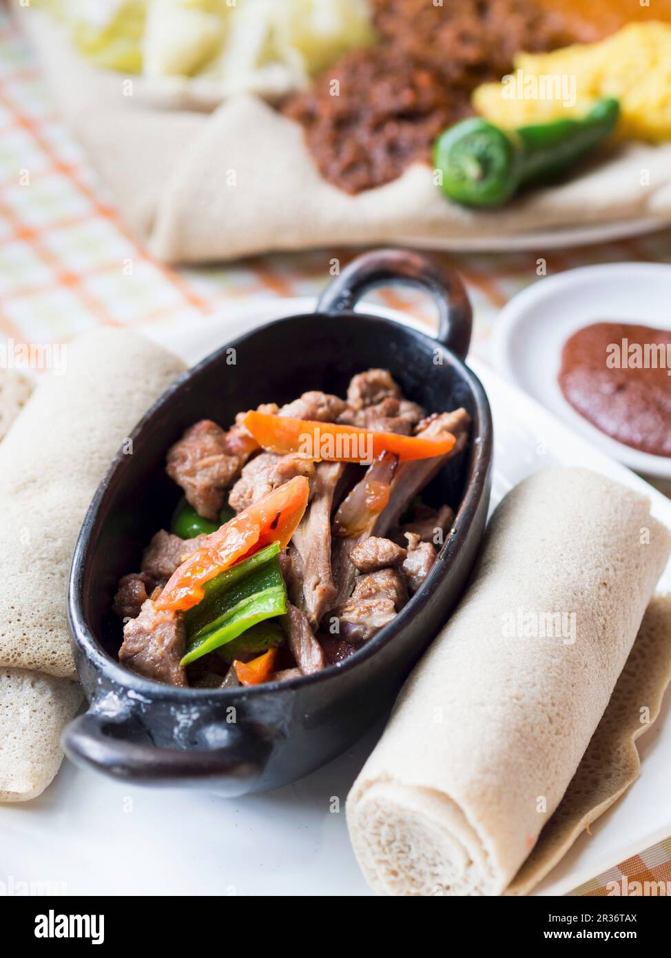 Yebeg banatu (Ethiopian braised lamb Stock Photo - Alamy