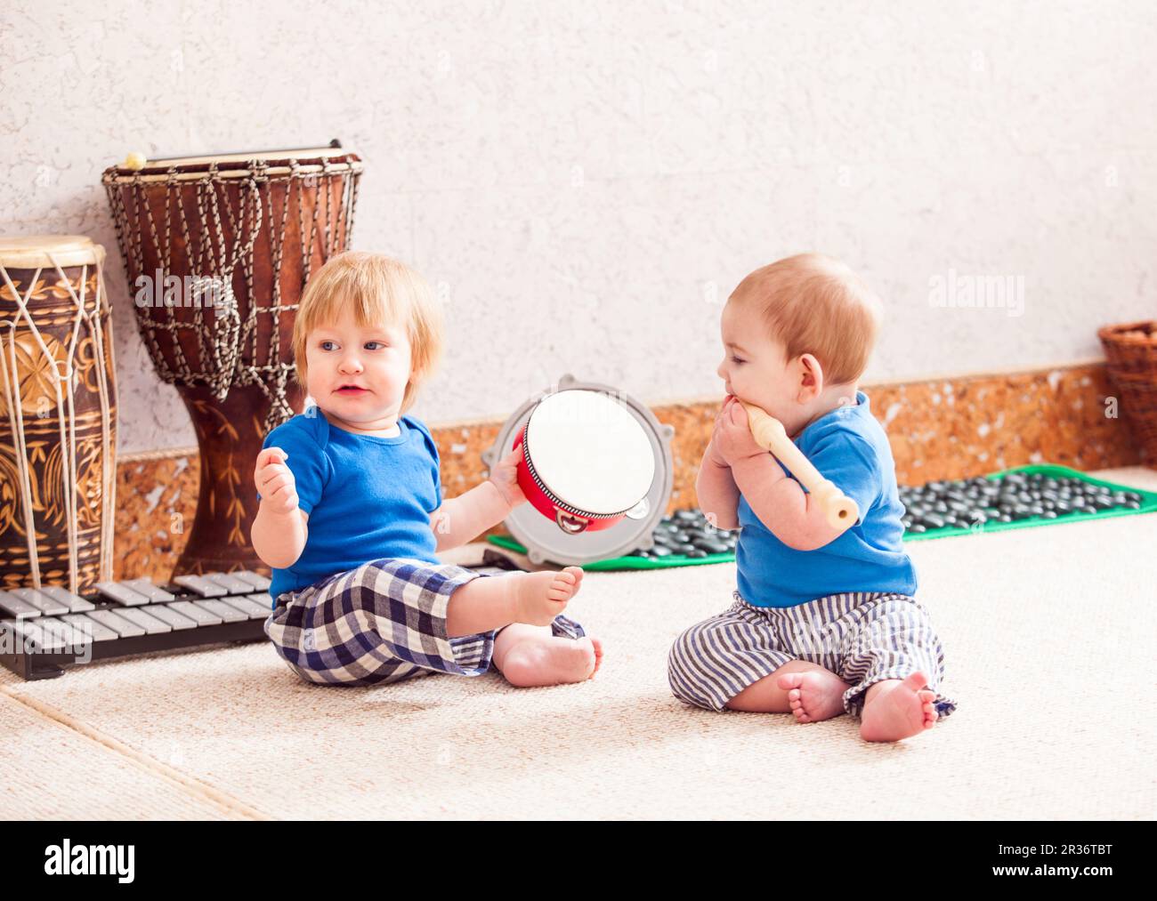 Boys with musical instruments Stock Photo - Alamy