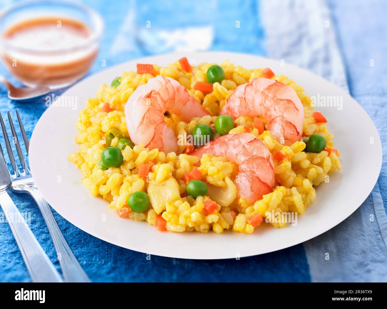 Prawn & pea risotto Stock Photo - Alamy