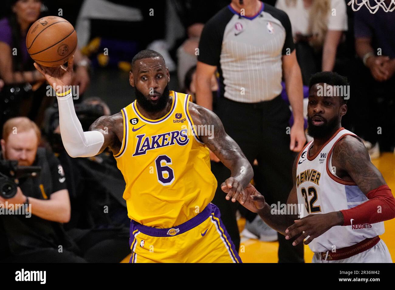 Los Angeles Lakers forward LeBron James (6) passes next to Denver ...