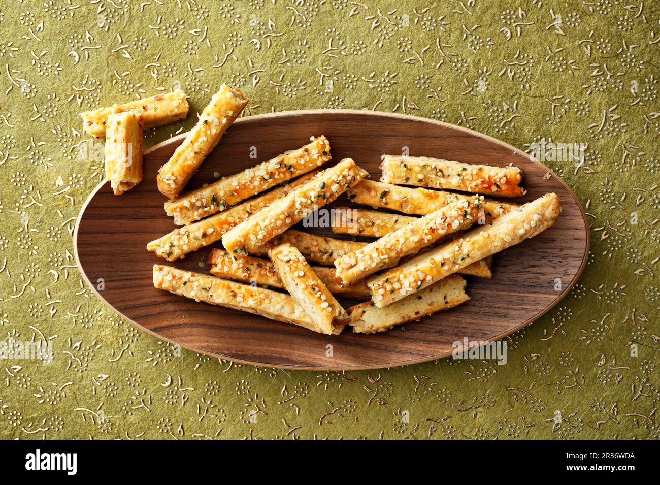 Savoury shortbread sticks with sesame seeds and rosemary Stock Photo ...