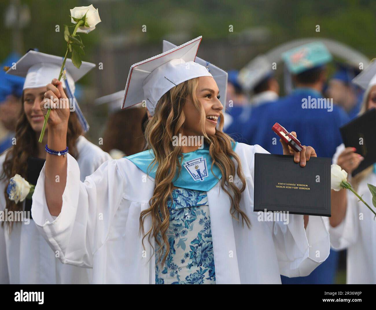Graduate and National Honor Society member Shannon Tokarsky celebrates ...