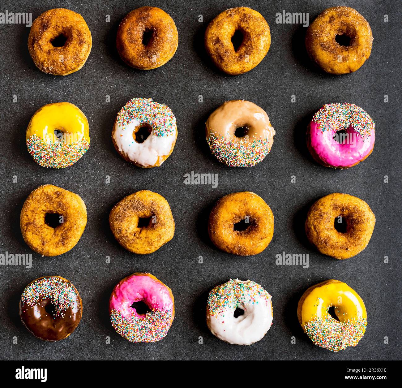 Assorted doughnuts in rows Stock Photo - Alamy
