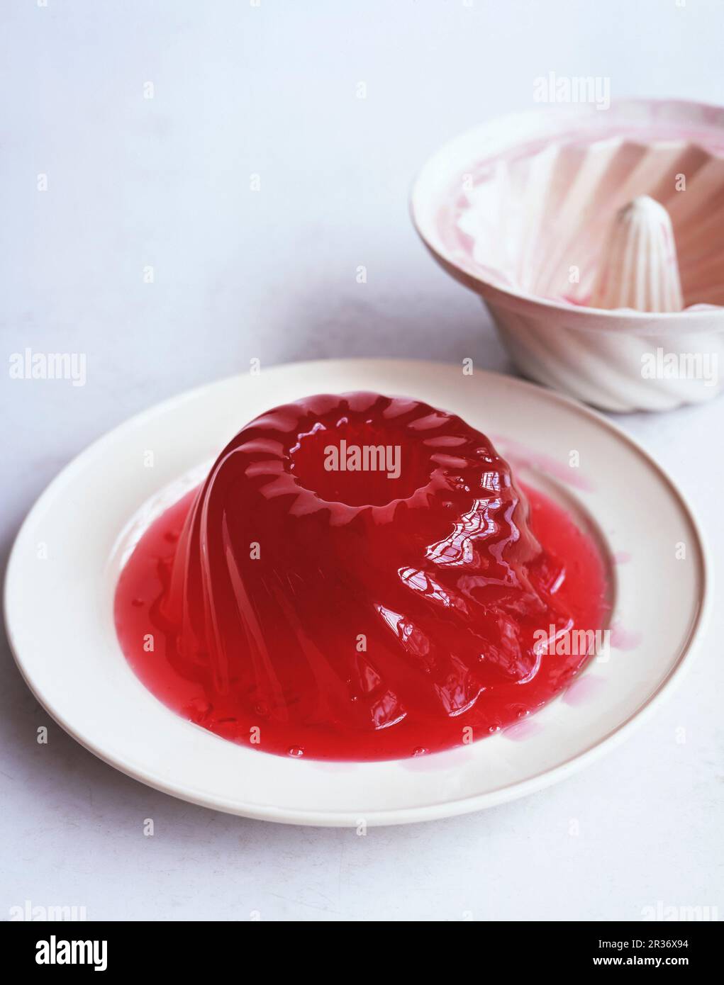 Red jelly shaped like a Bundt cake Stock Photo - Alamy