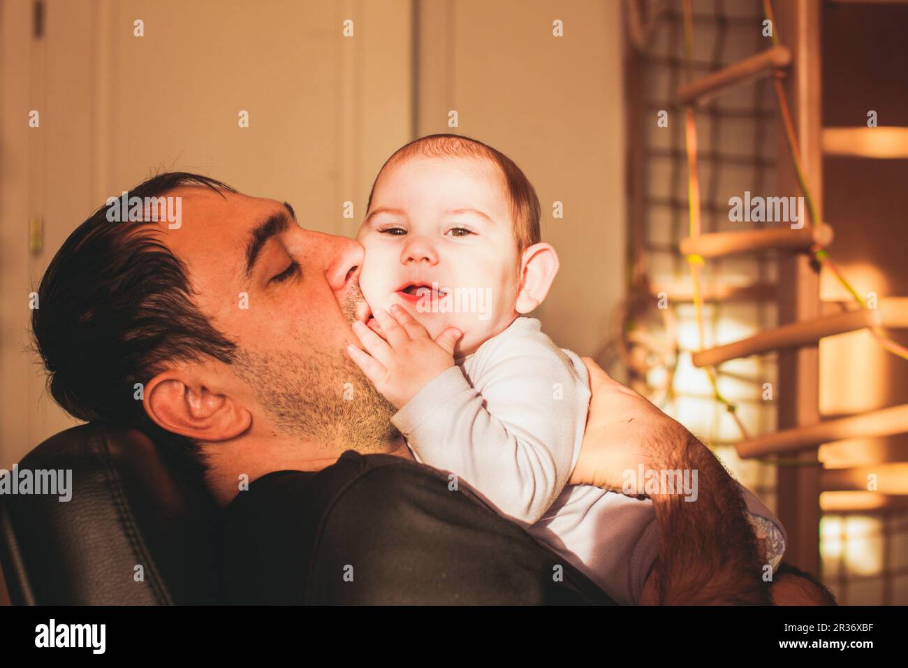 Love of father to his baby Stock Photo - Alamy