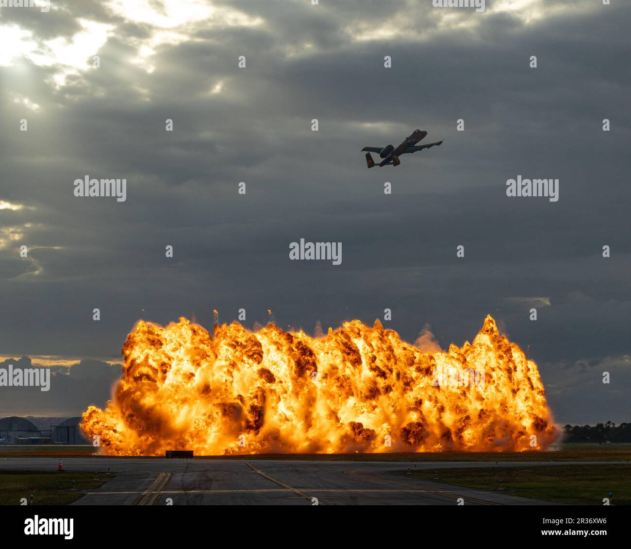 An amazing plane and explosion Stock Photo - Alamy