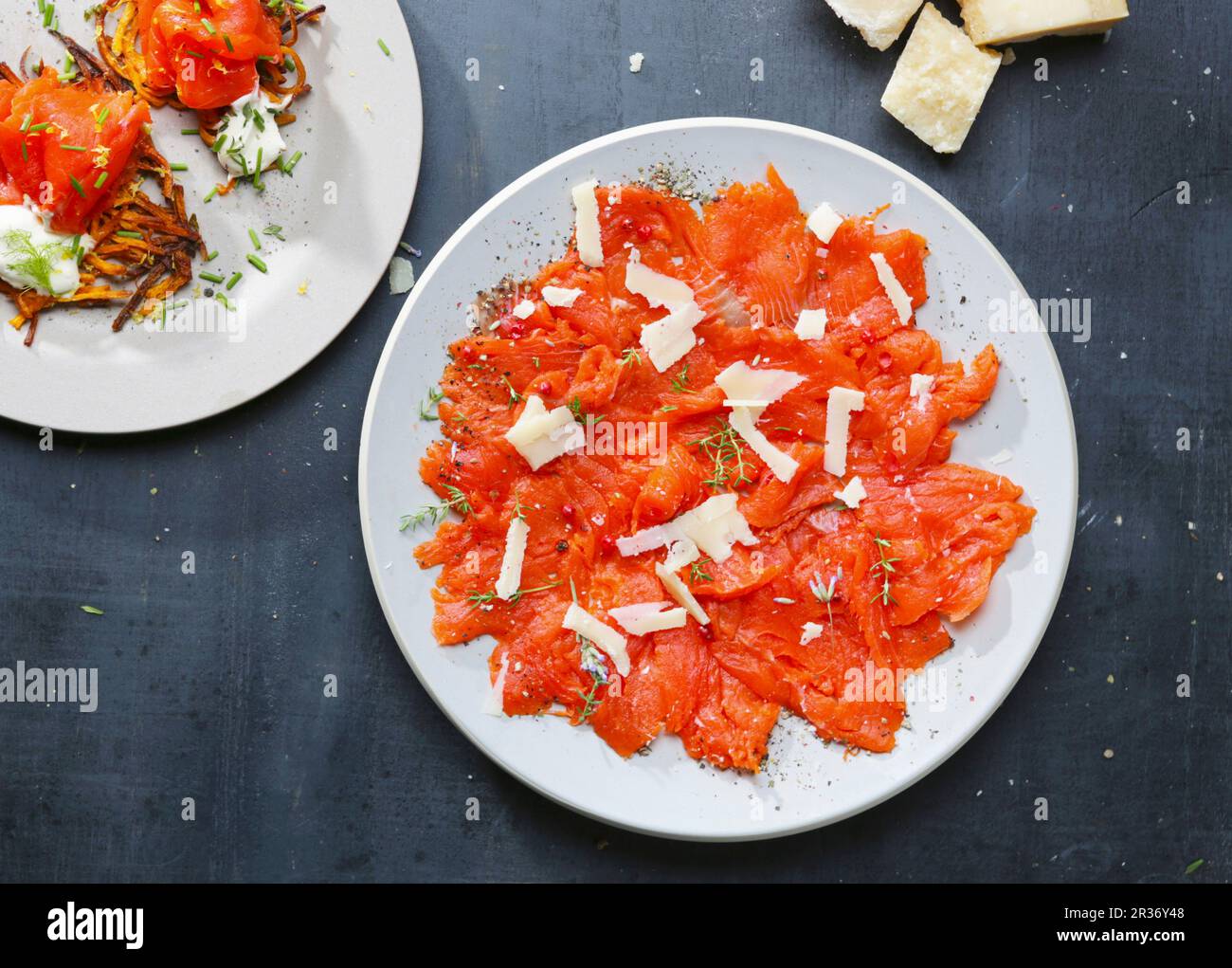 Salmon carpaccio with Parmesan shavings served with vitelotte Rösti ...