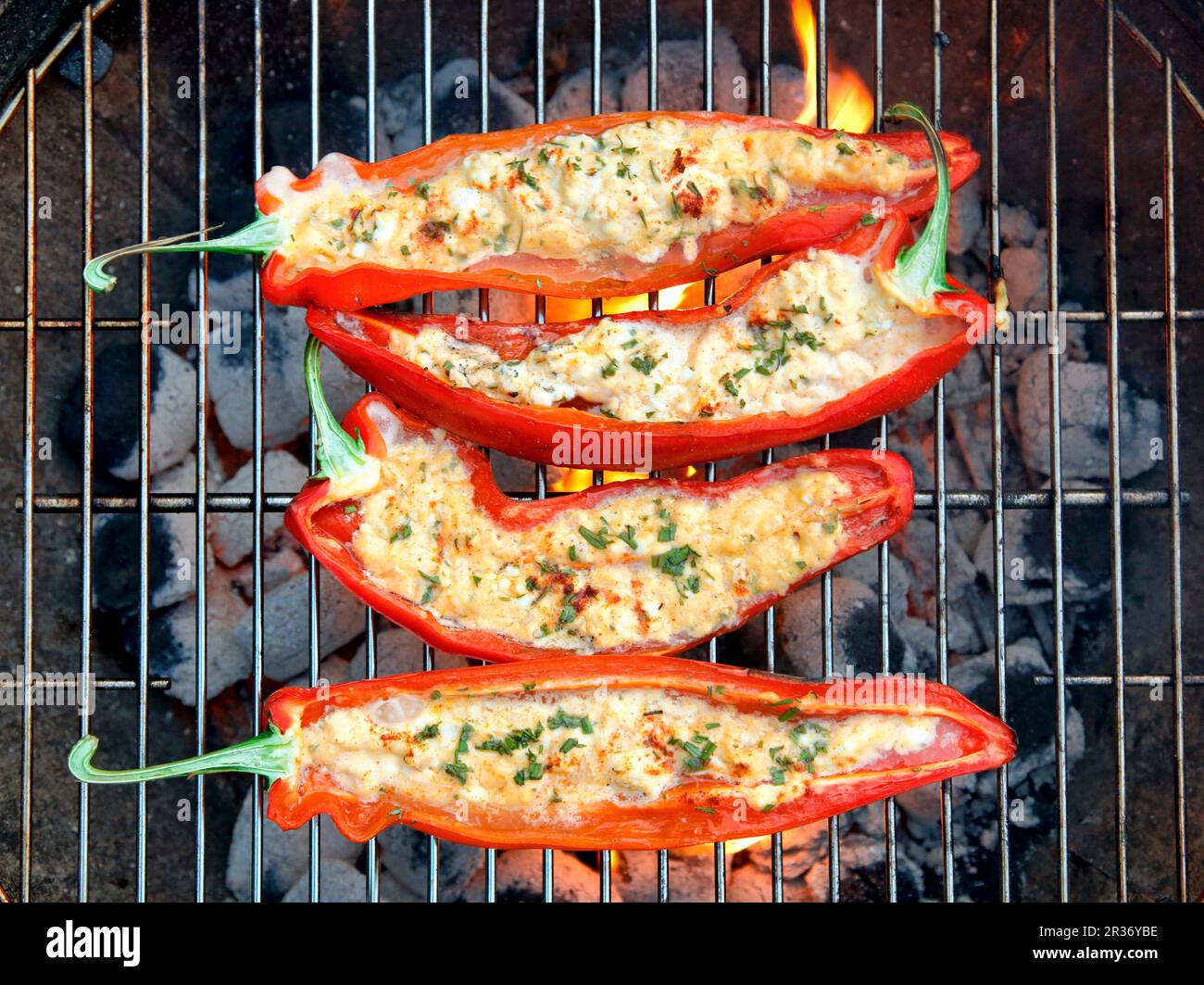 Grilled red peppers with sheep's cheese and rosemary Stock Photo - Alamy
