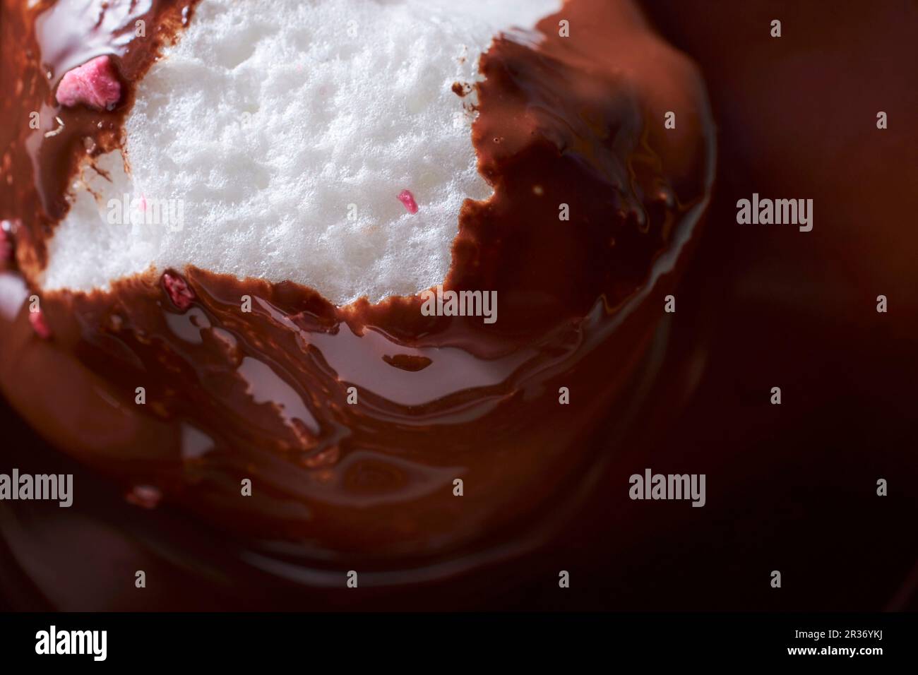 A floating island in chocolate sauce (close-up Stock Photo - Alamy