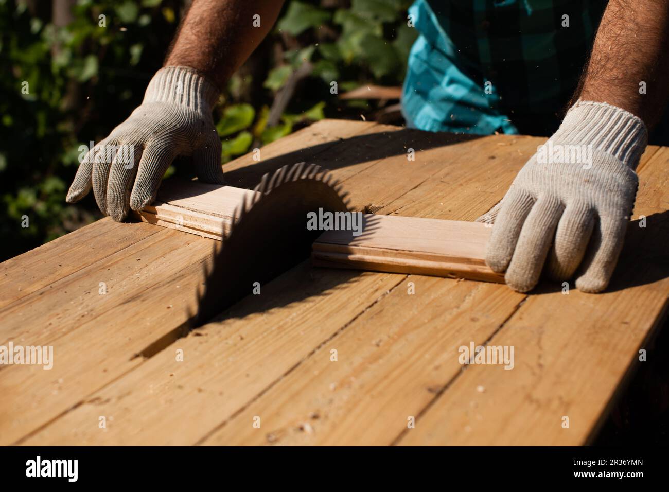 Hard work on the sawmill Stock Photo - Alamy