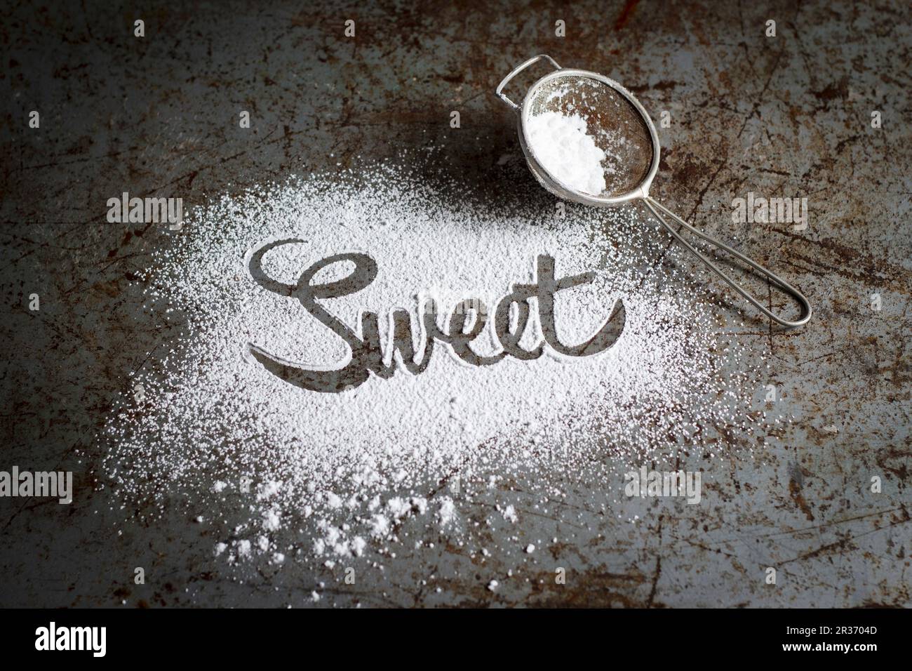 Icing sugar in sieve hi-res stock photography and images - Alamy